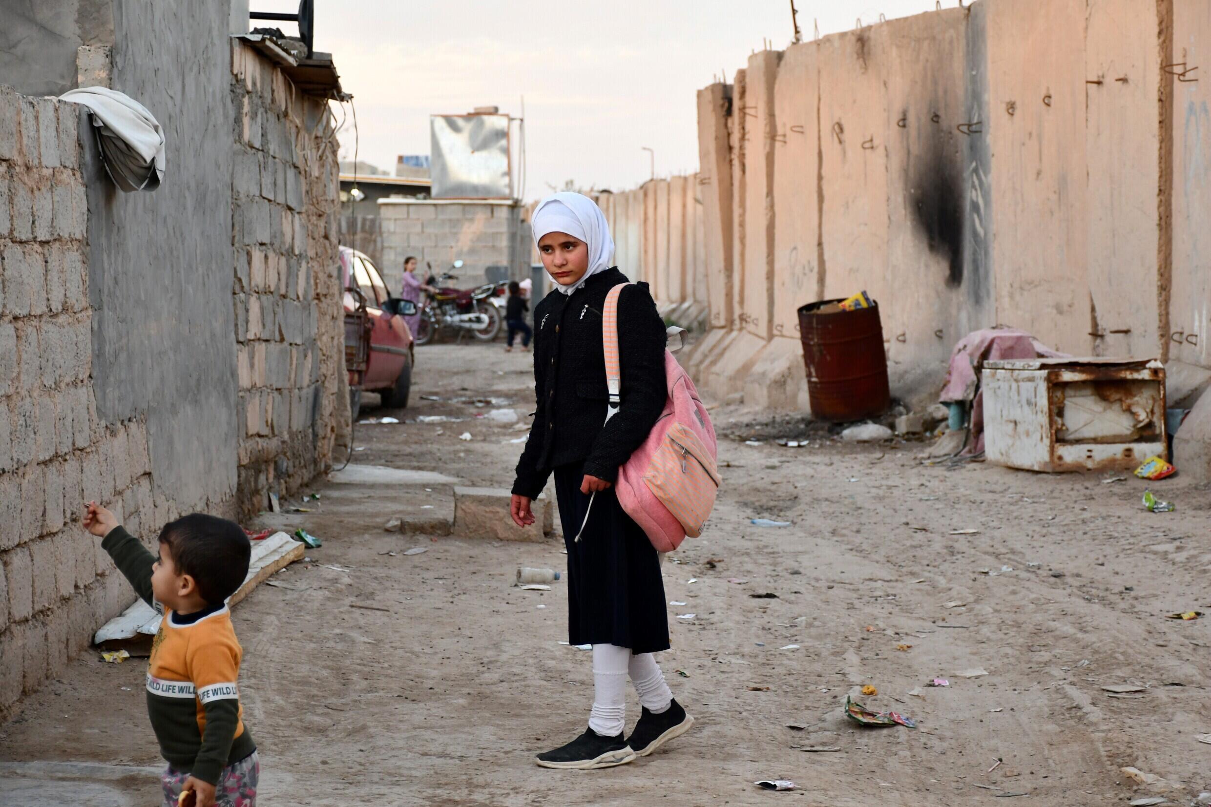 Years after civil war, security wall holds back Iraqi city