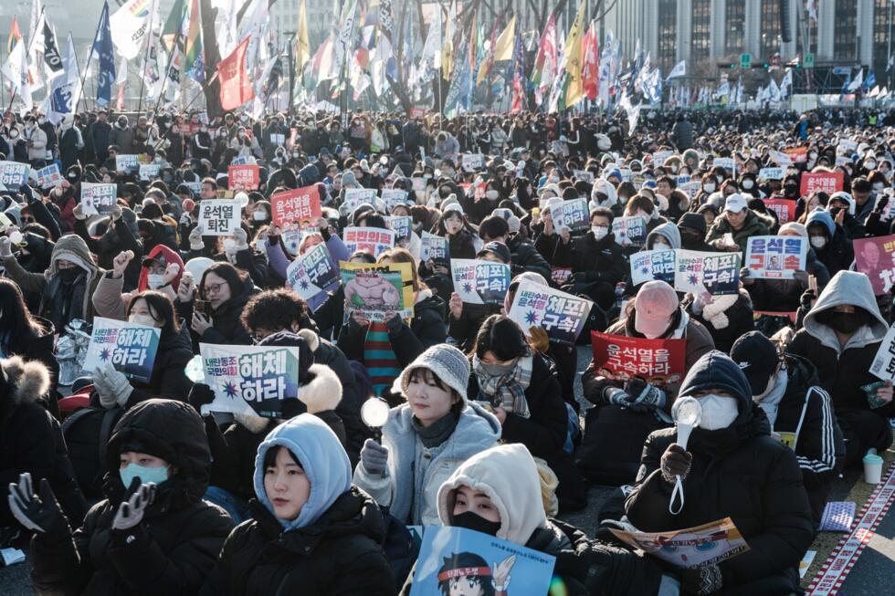 Thousands of South Koreans protest as president digs heels in