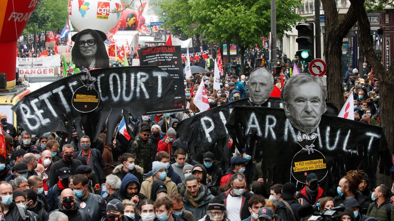 French workers celebrate May Day despite clashes and arrests in Paris, Lyon