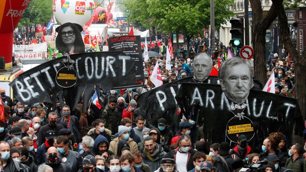 French workers celebrate May Day despite clashes and arrests in Paris, Lyon