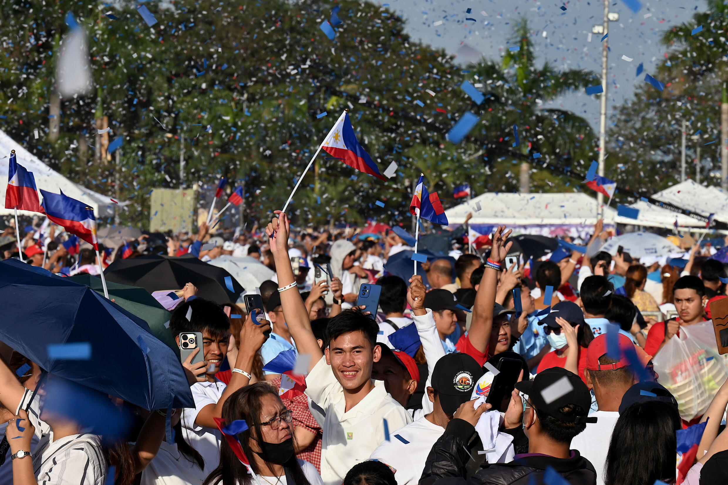 Marcos, Duterte supporters rally in Philippines as family rift deepens