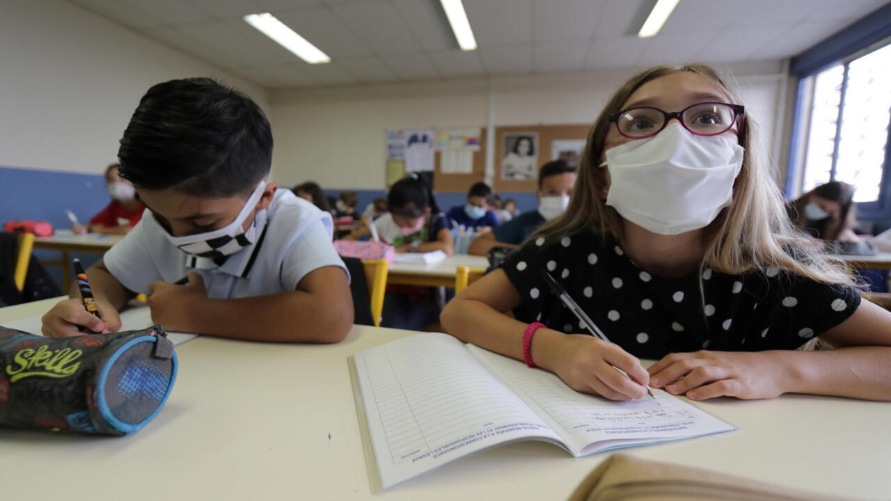 French parents seek legal action over reintroduction of Covid masks for ...