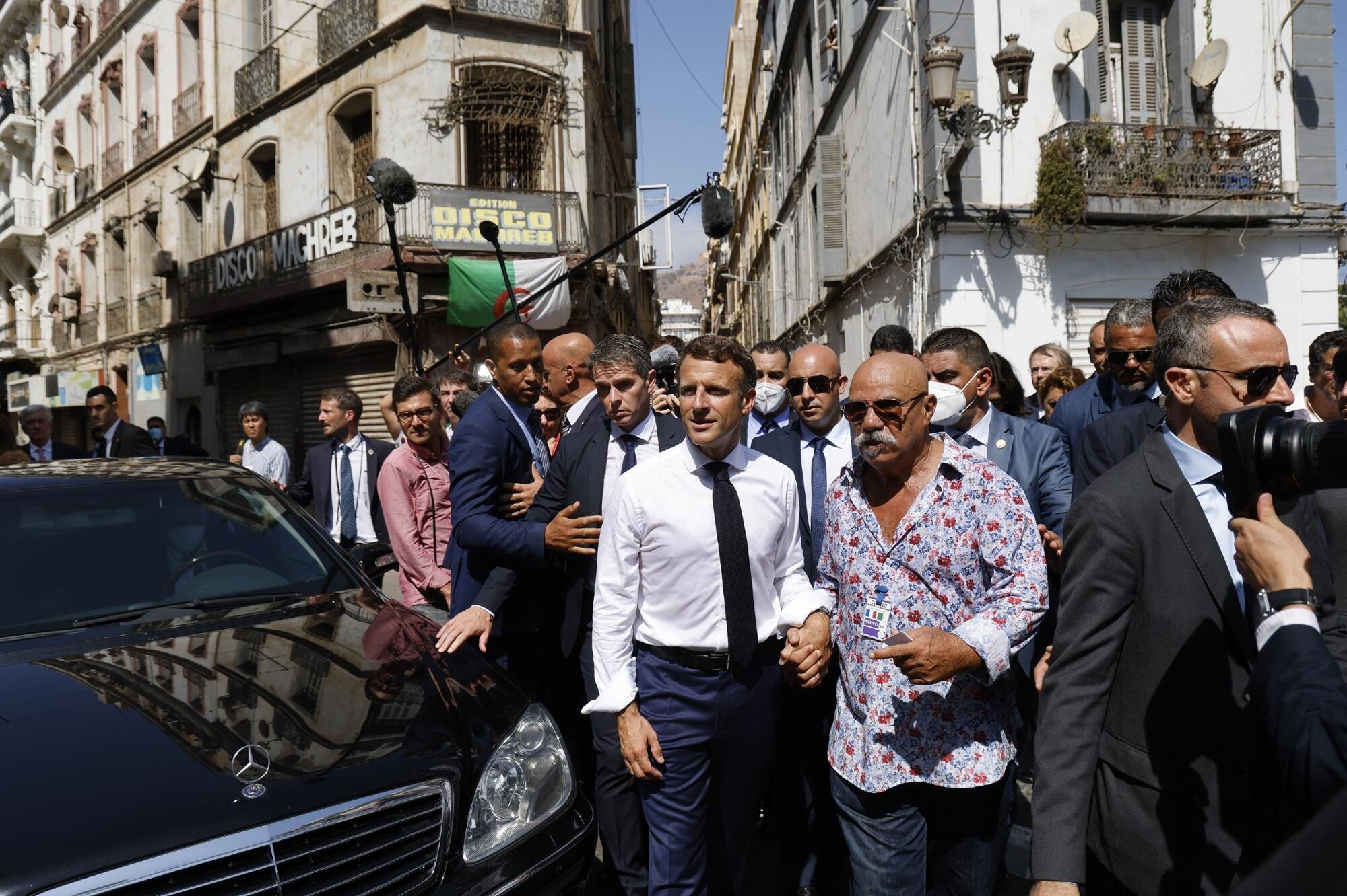 Macron visits the 'birthplace of Rai' in Oran as reconciliation visit ...