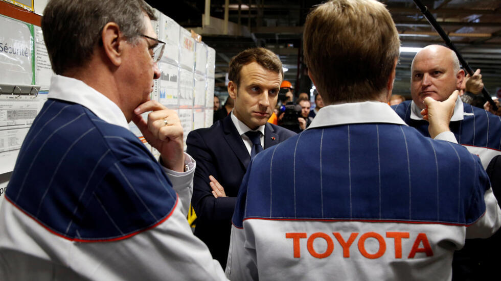 Macron urges 140 world CEOs to 'choose France' at Versailles