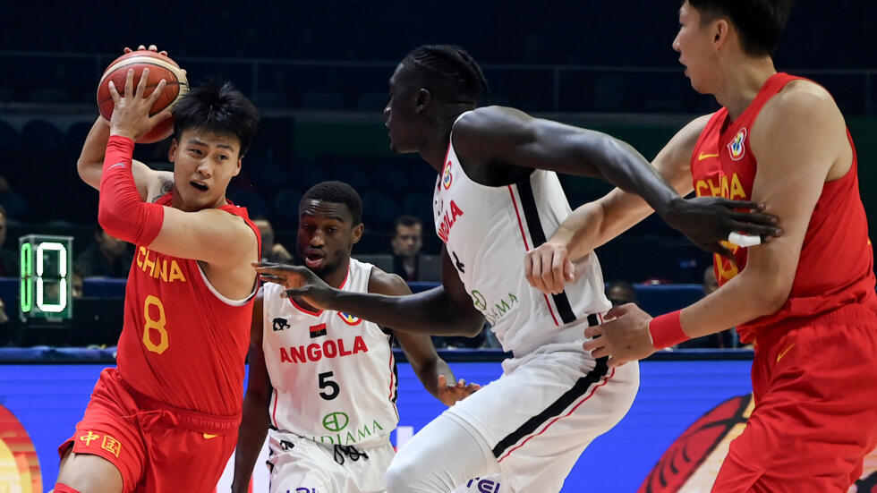 China's first win puts them back into Olympic basketball contention