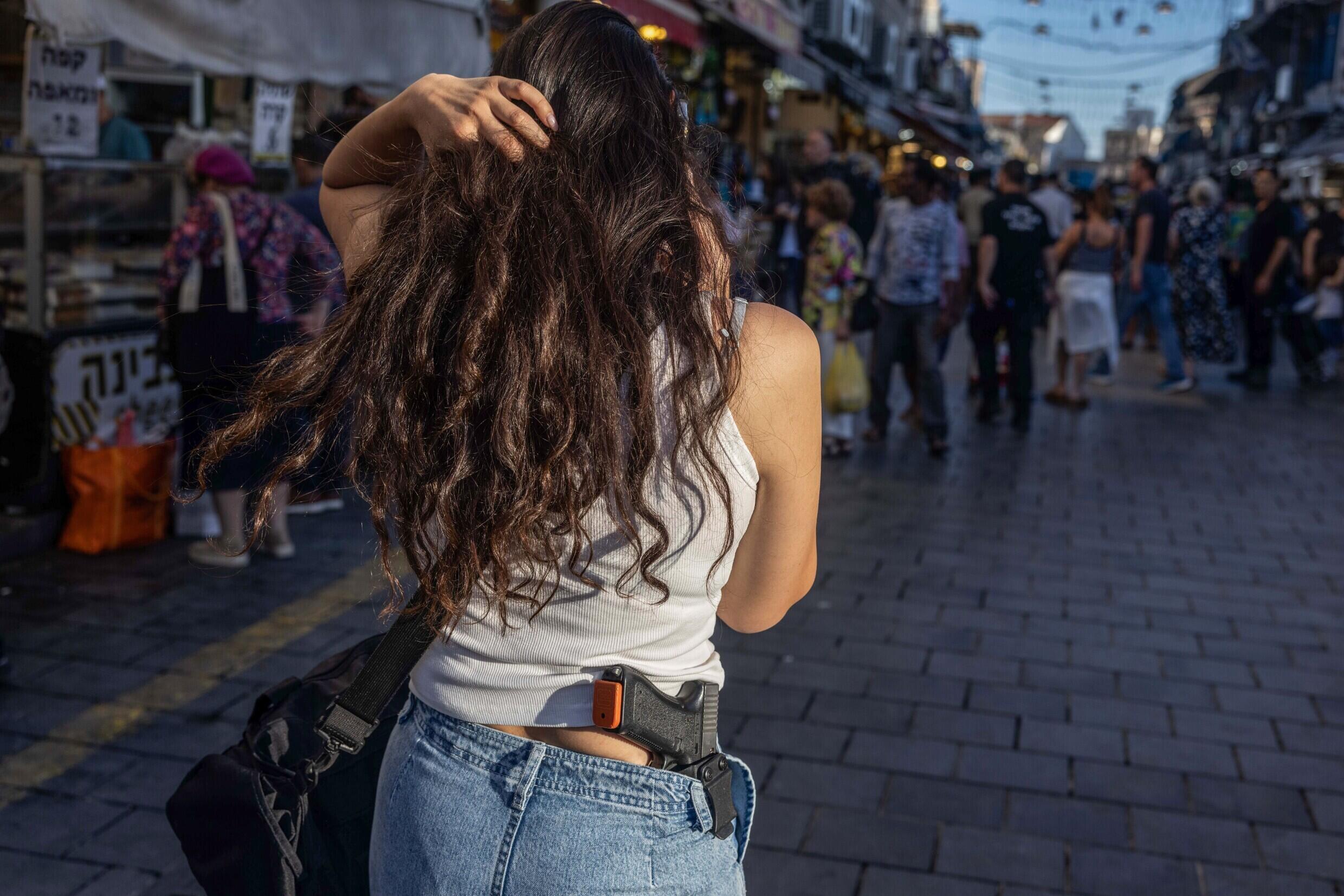 Israeli women rush to buy guns in October 7 aftermath