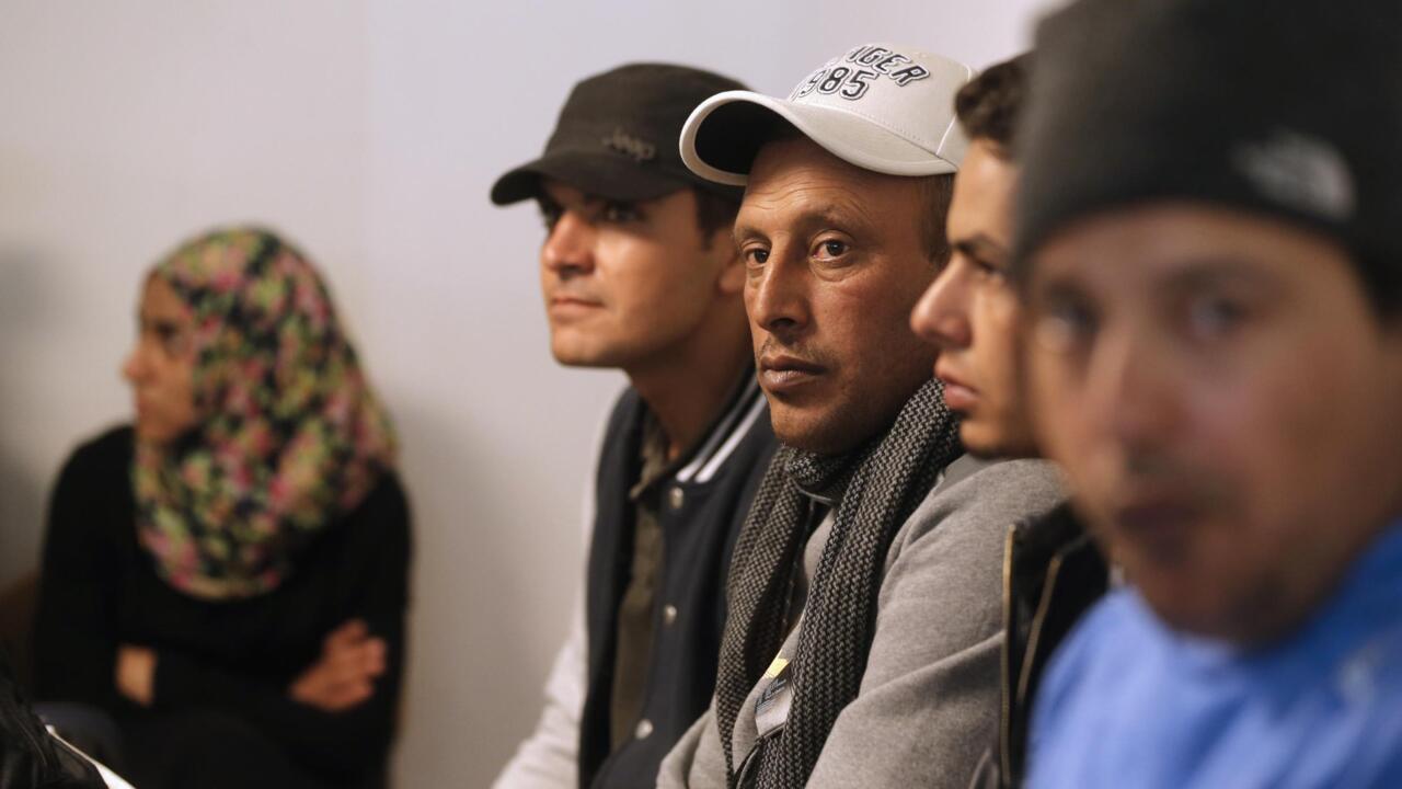 First refugees arrive in France as EU unveils plan for migrants