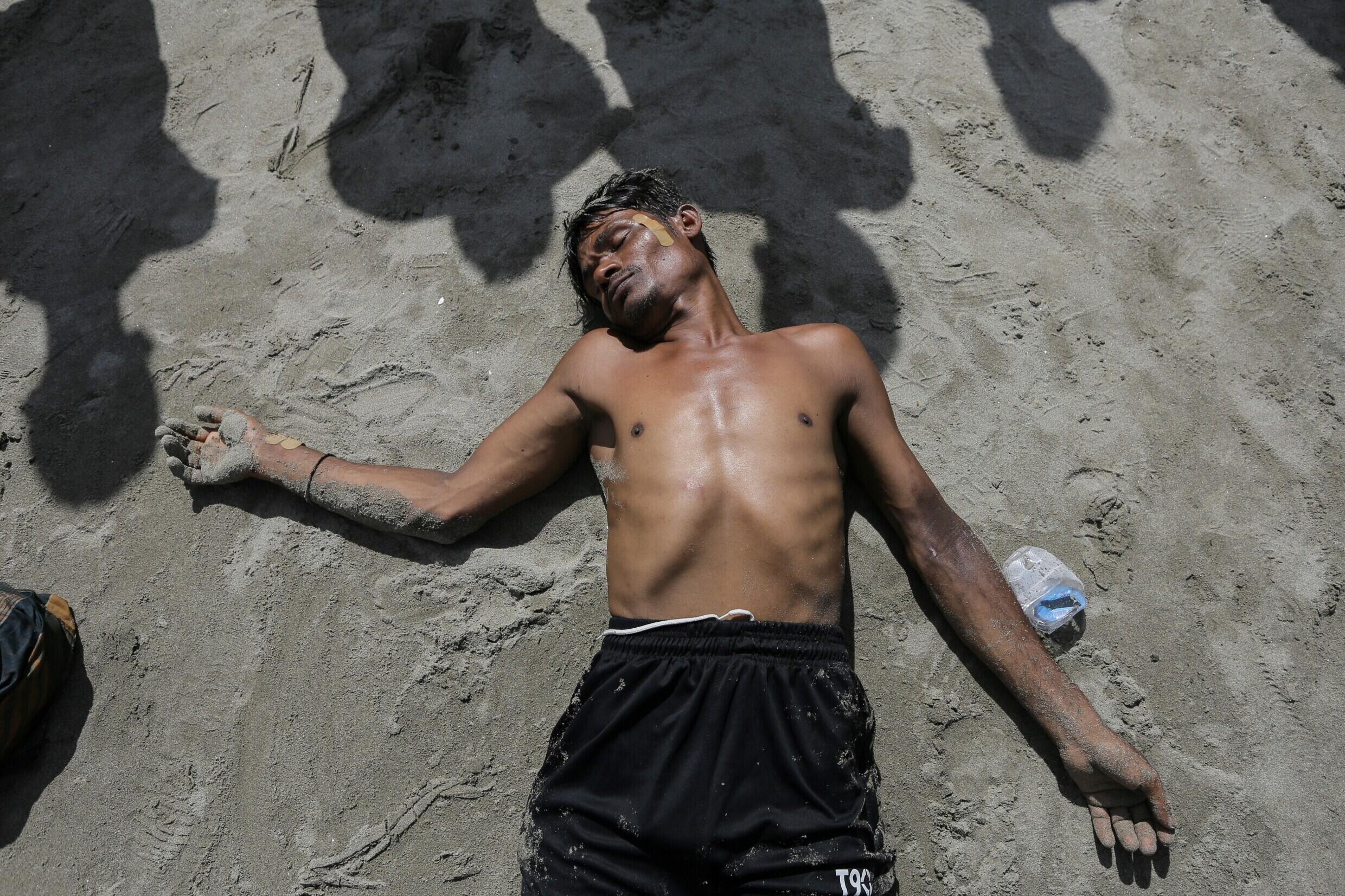 About 250 Rohingya refugees reach Indonesia's west on decrepit boat