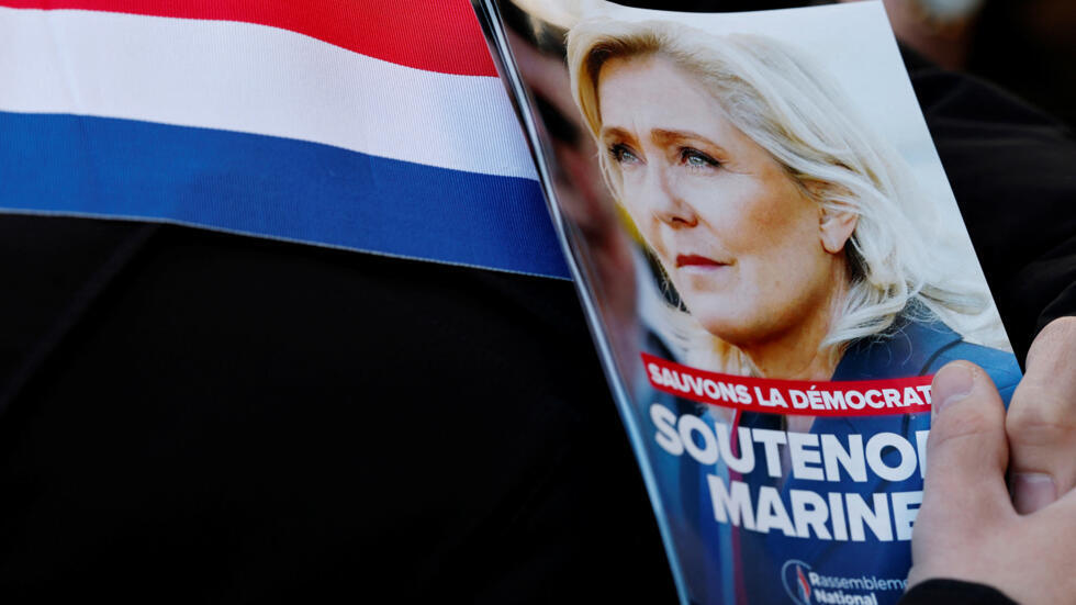 France's political parties hold parallel rallies in the name of democracy
