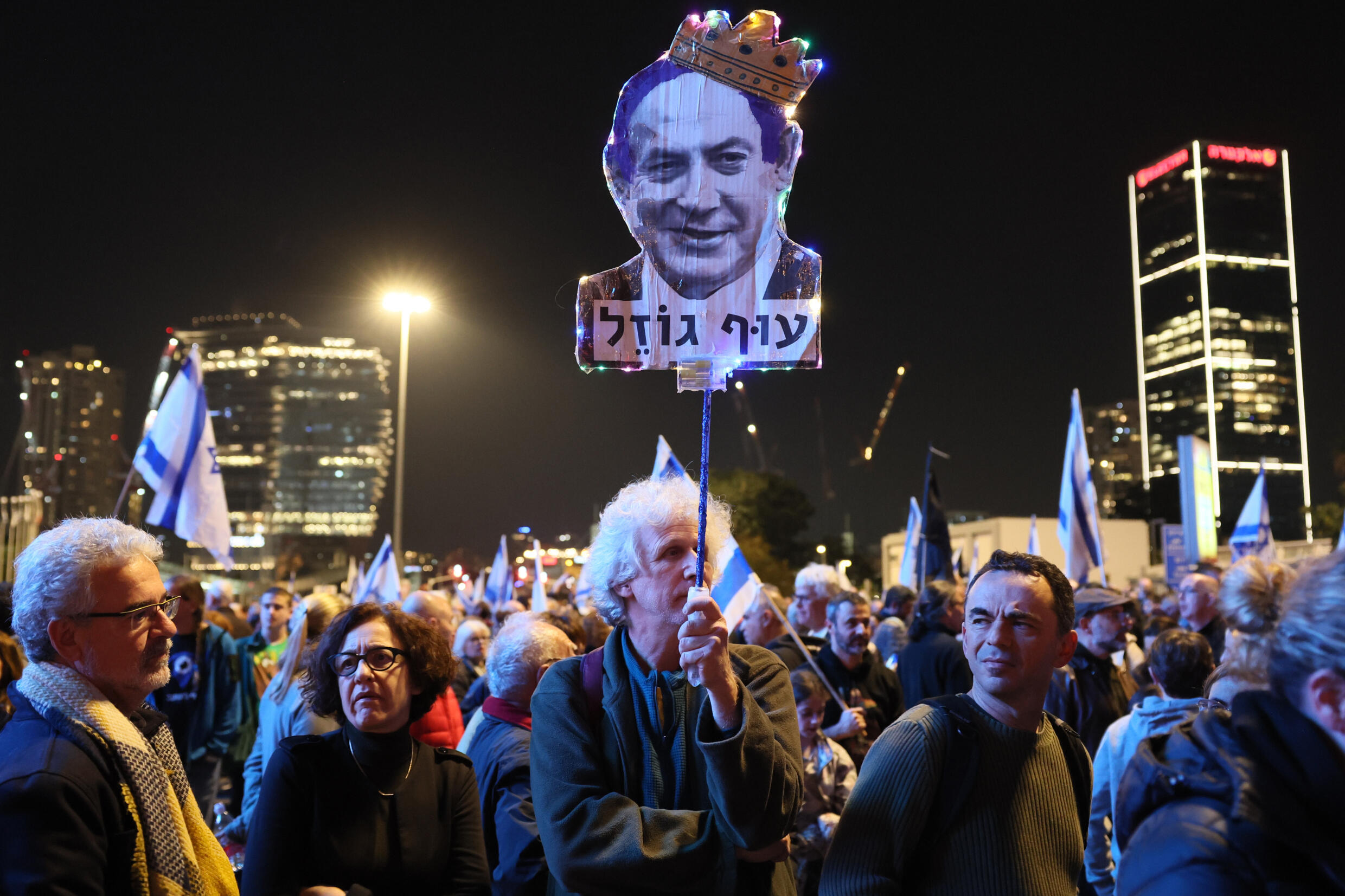 Former PM joins mass rally against Israel govt