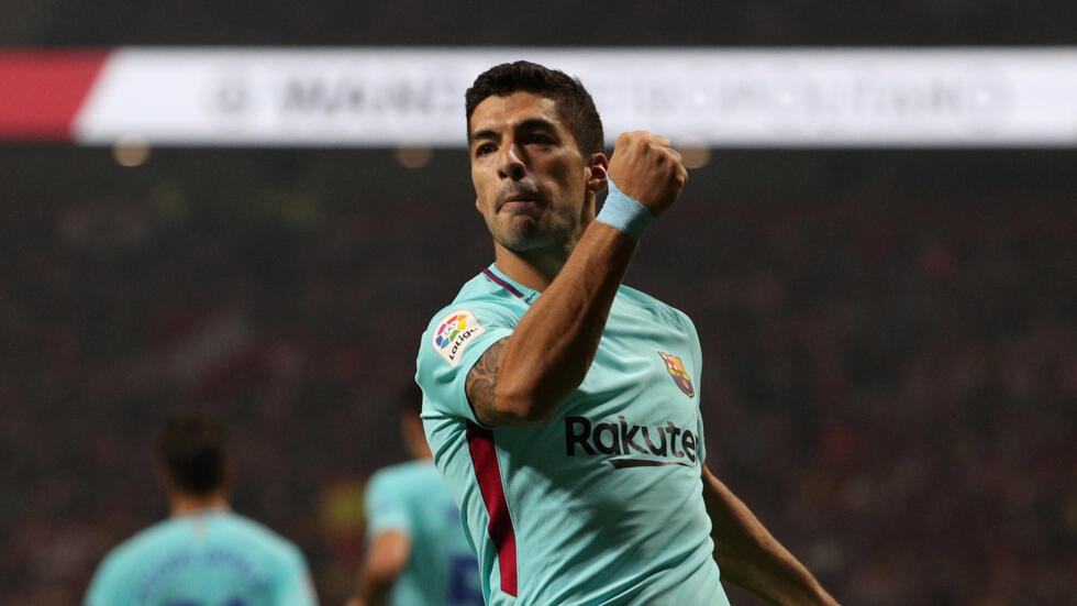 Suarez saves Barcelona at Atletico Madrid
