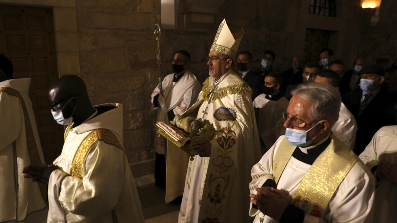 Subdued celebrations mark Christmas under Covid in Bethlehem and beyond