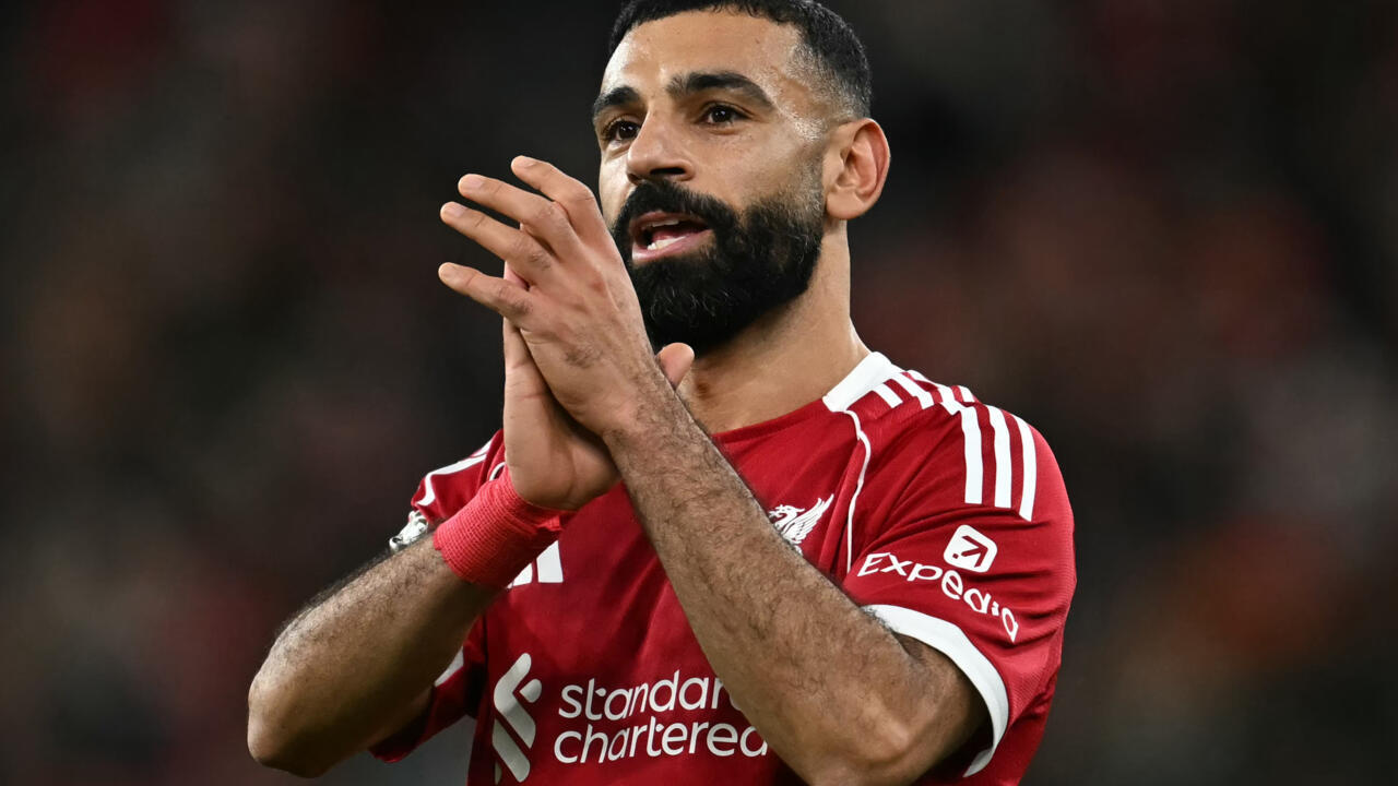 Salah back in Liverpool fold as Arsenal grab last-gasp win