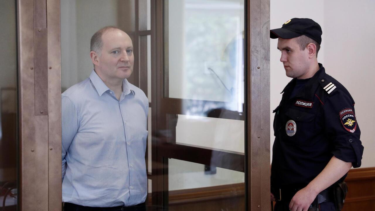 Russia releases French banker from jail into house arrest