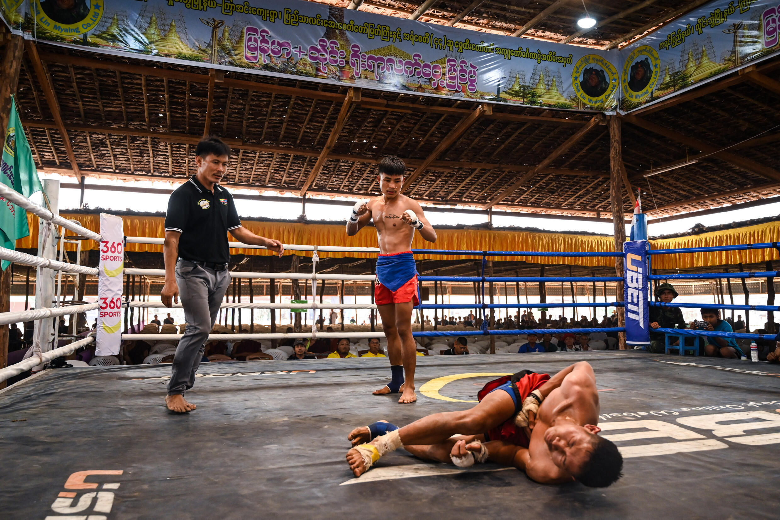 Myanmar traditional boxing packs a punch, kick and headbutt
