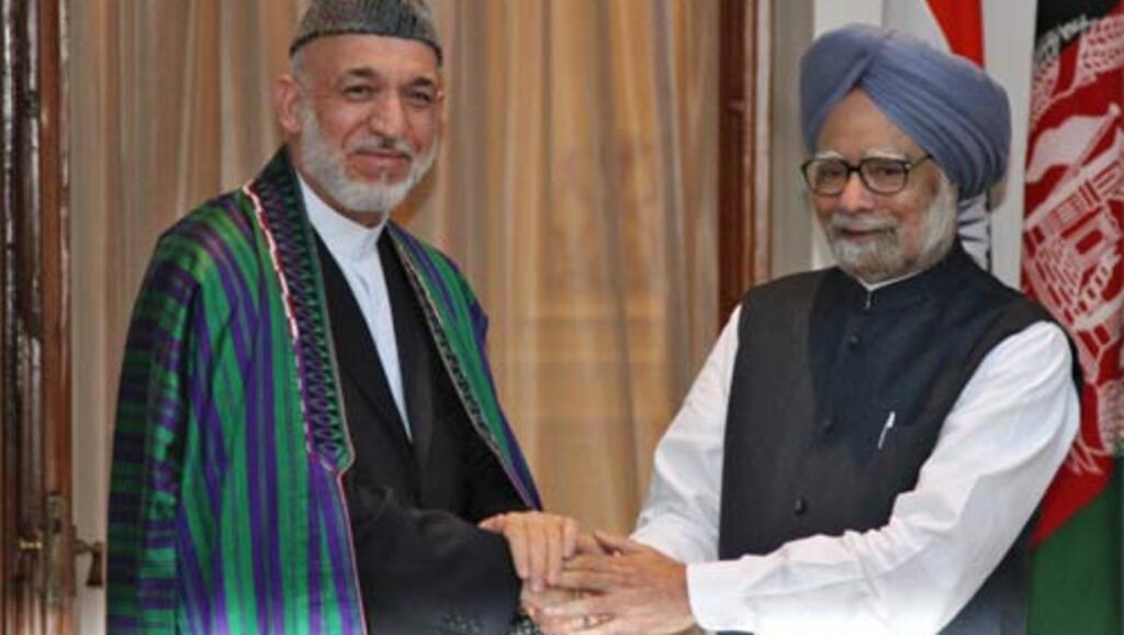 Karzai to sign security deals on India visit