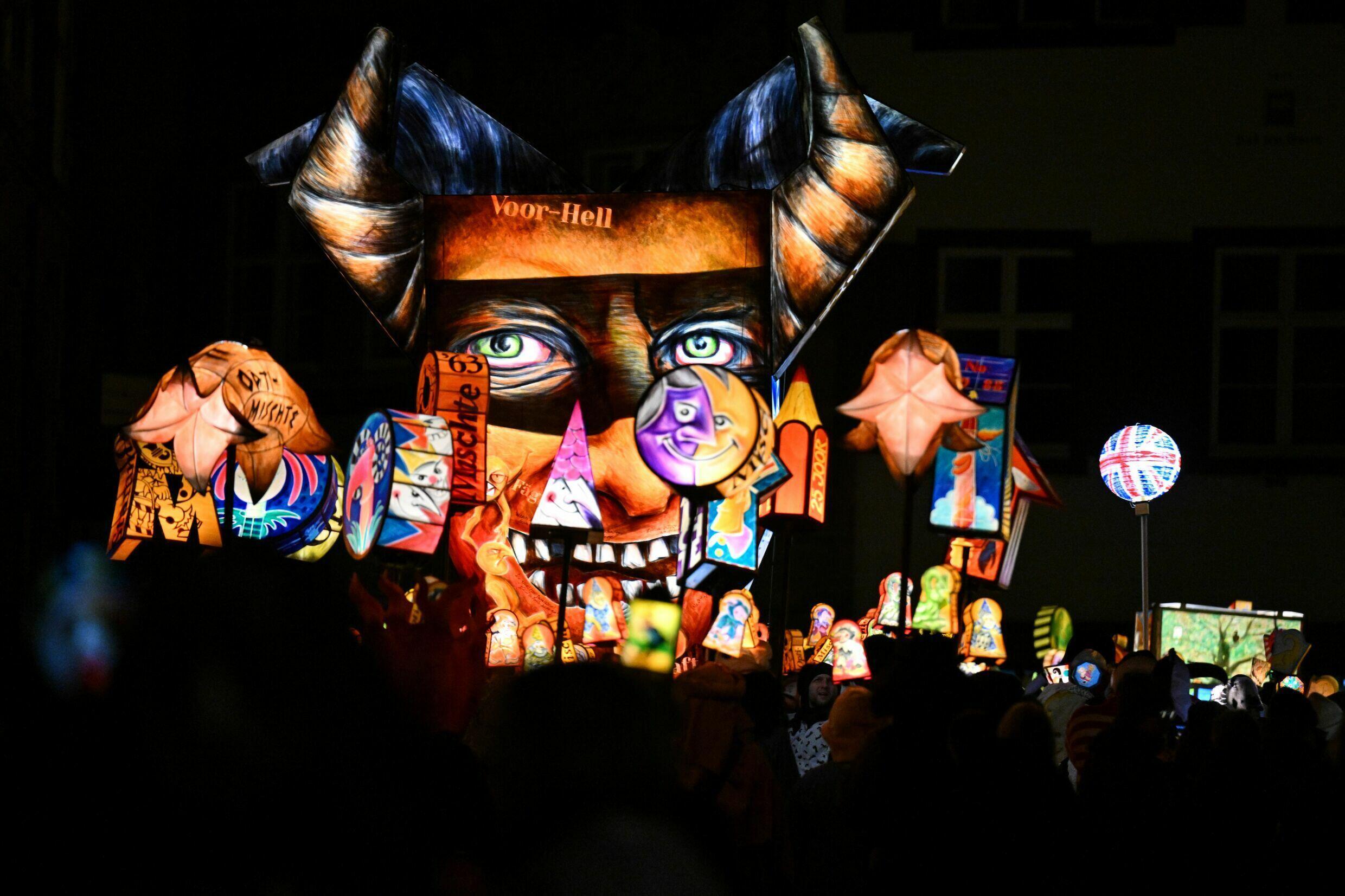 Lanterns light the way as Basel carnival comes back