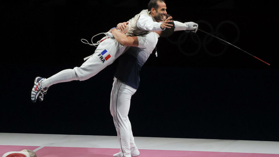 Olympics Day 9: Gold for France's fencing team, silver in swimming