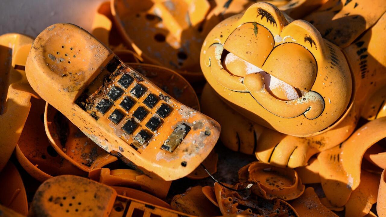 Activists solve 30-year mystery of Garfield phones washing up on French ...