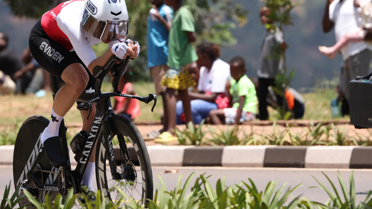 Reusser and Evenepoel take first titles at world cycling championships ...