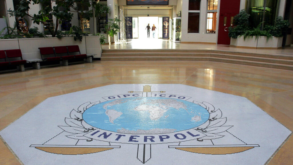 Interpol fights crime and controversial image, 100 years on